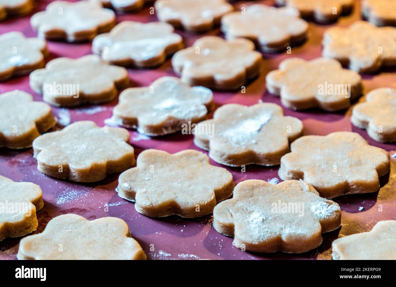Christmas cookies on the baking sheet Stock Photo - Alamy