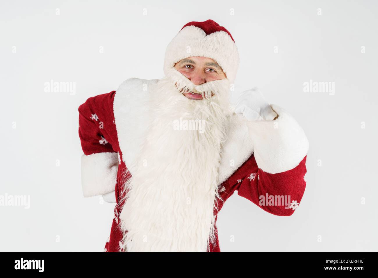 Christmas and New Years concept. Santa Claus shows a YES gesture with ...