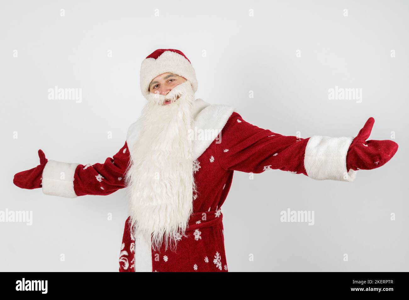 New Year and Christmas concept. Santa Claus throws up his hands in ...