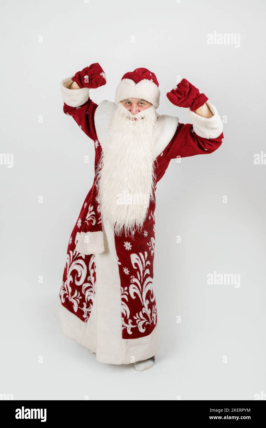 Holidays and christmas concept. Santa Claus is dancing. Isolated on ...