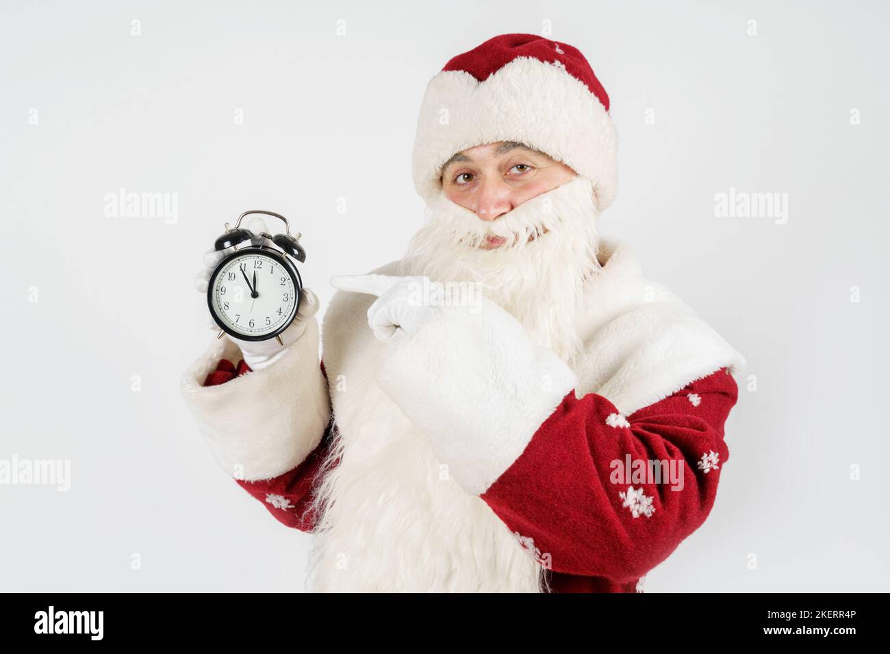 Holidays and Christmas concepts. Santa Claus shows the time remaining ...