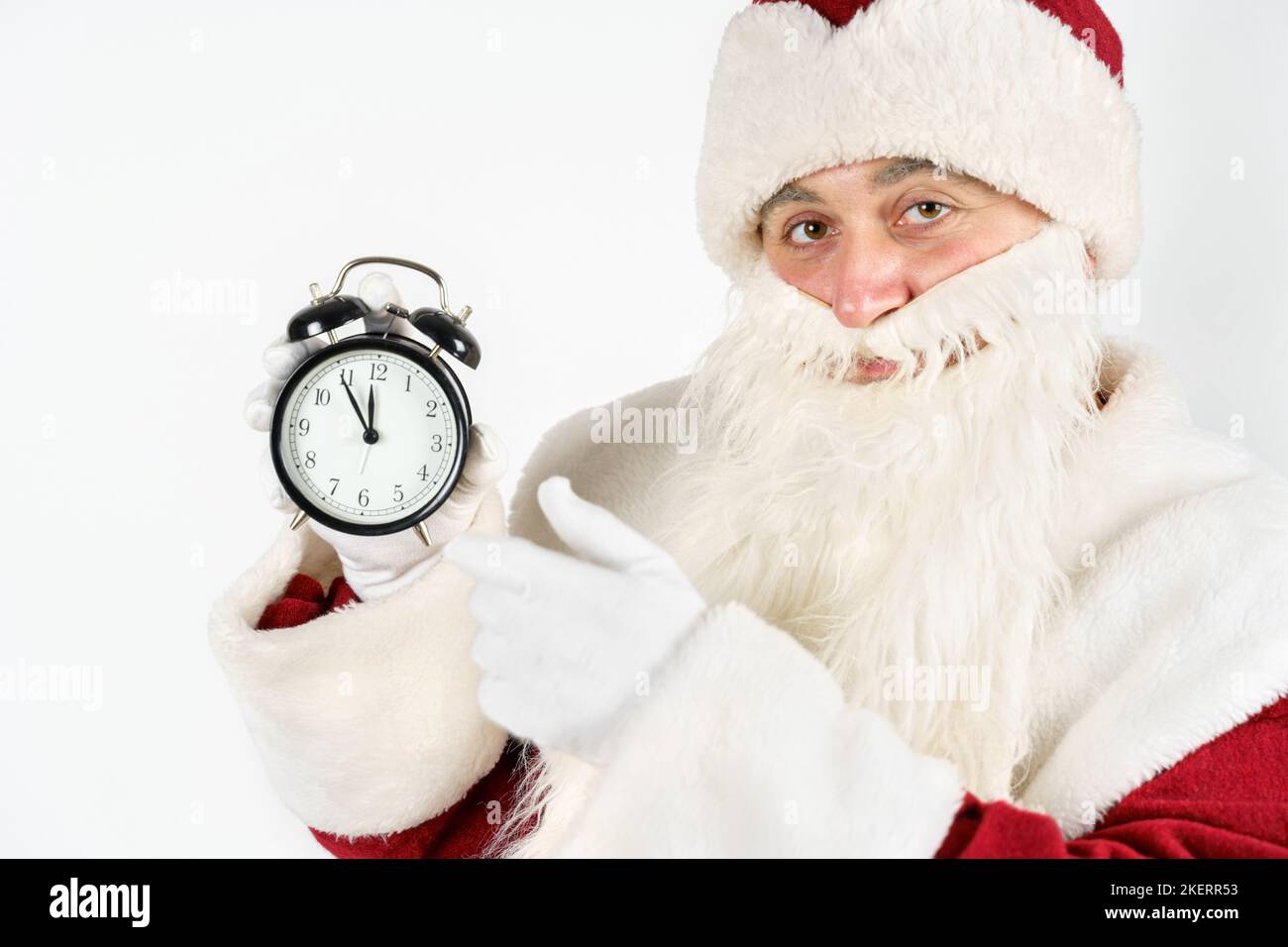 Holidays and Christmas concepts. Santa Claus shows the time remaining ...