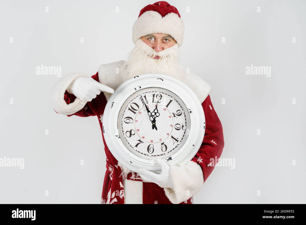 Holidays and Christmas concepts. Santa Claus shows the time remaining ...