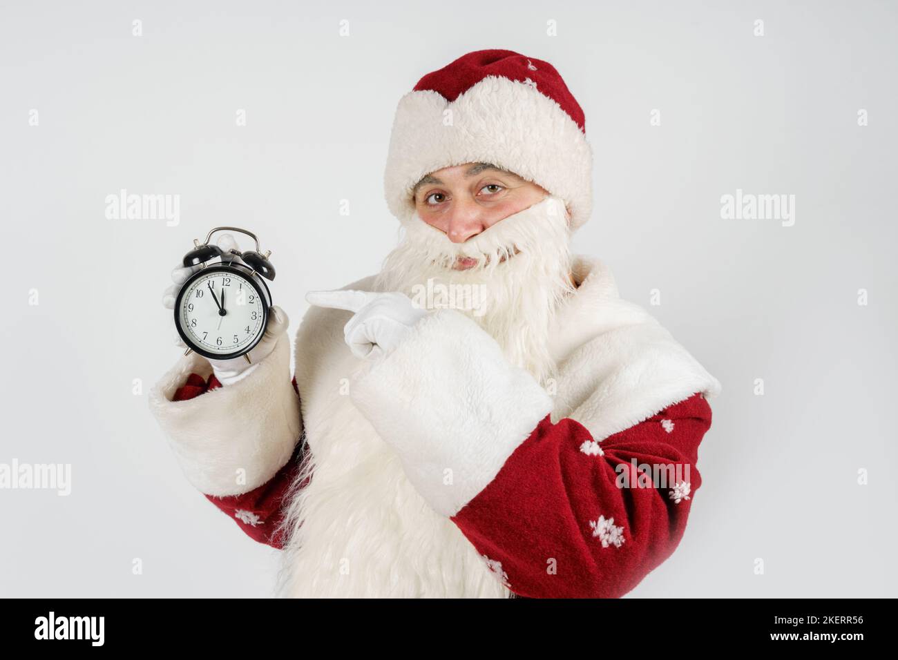 Holidays and Christmas concepts. Santa Claus shows the time remaining ...