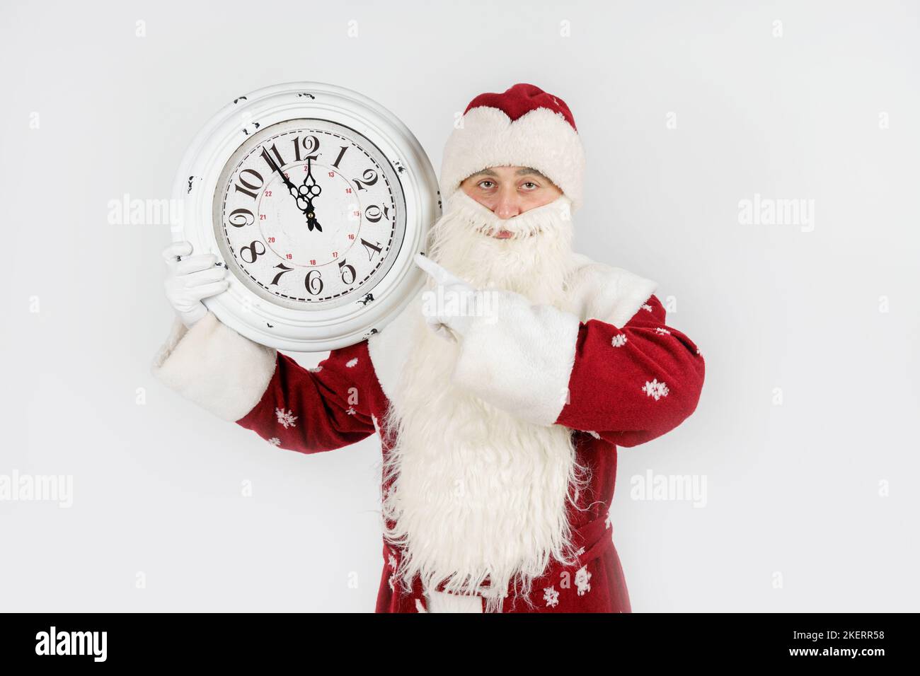 Holidays and Christmas concepts. Santa Claus shows the time remaining ...