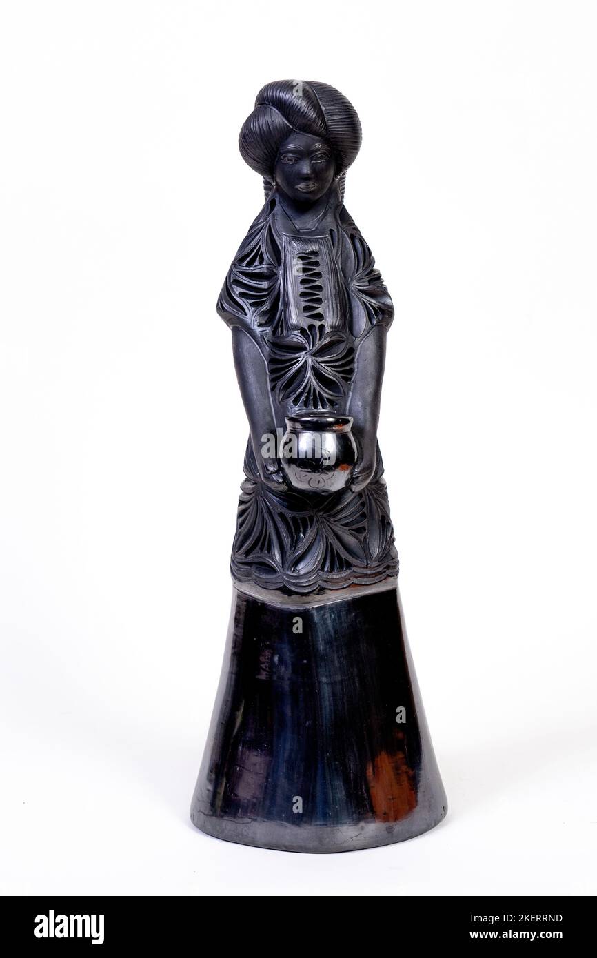 A Oaxacan black pottery figure of an indigenous Yalalag Zapotec woman ...