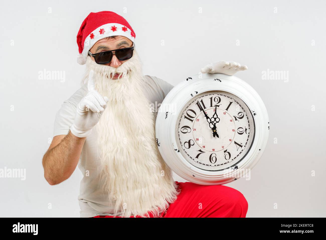Holidays and Christmas concepts. Santa Claus shows the time remaining ...