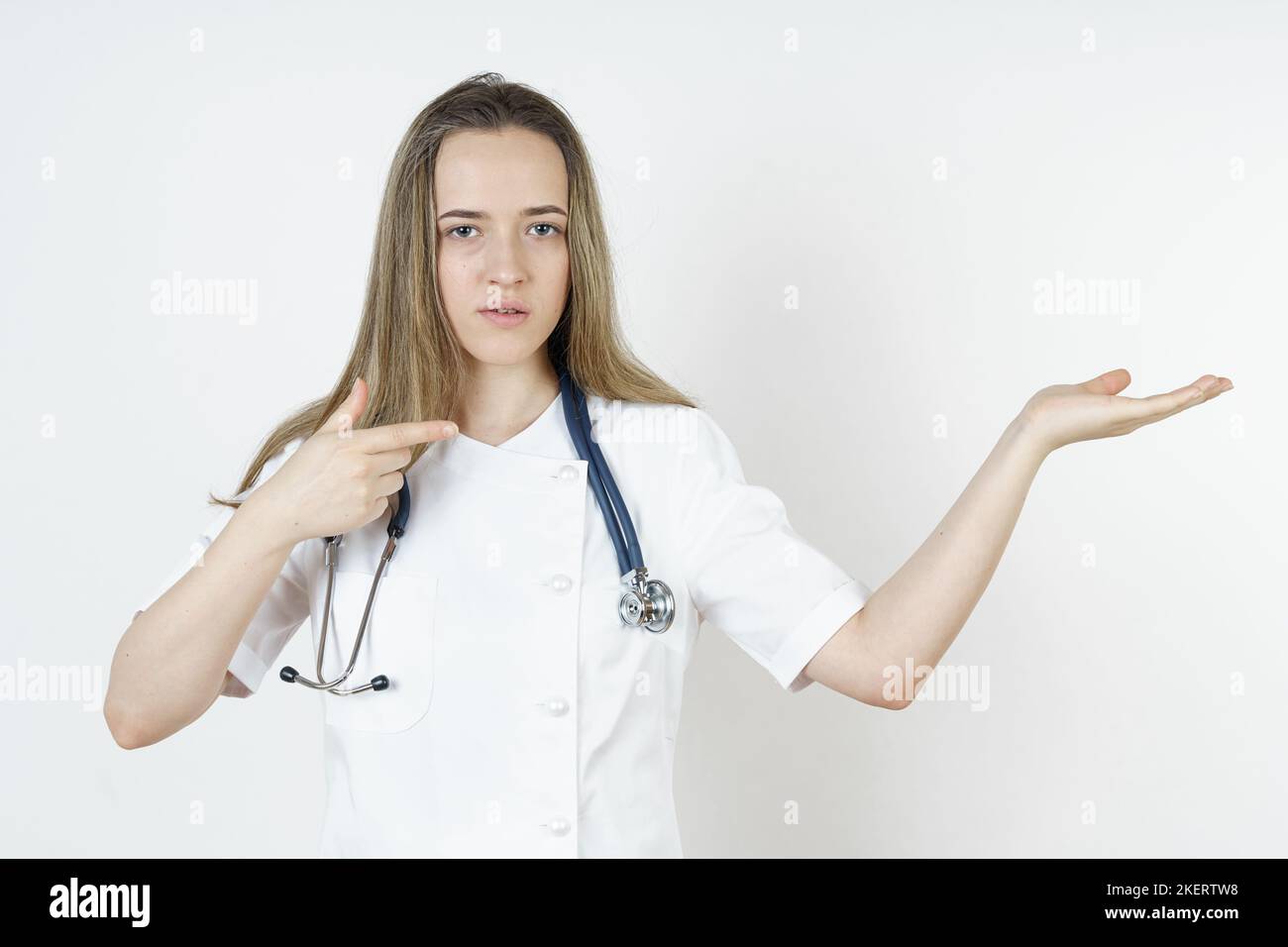 Medicine and health concept. Doctor pointing with his hands to the side ...