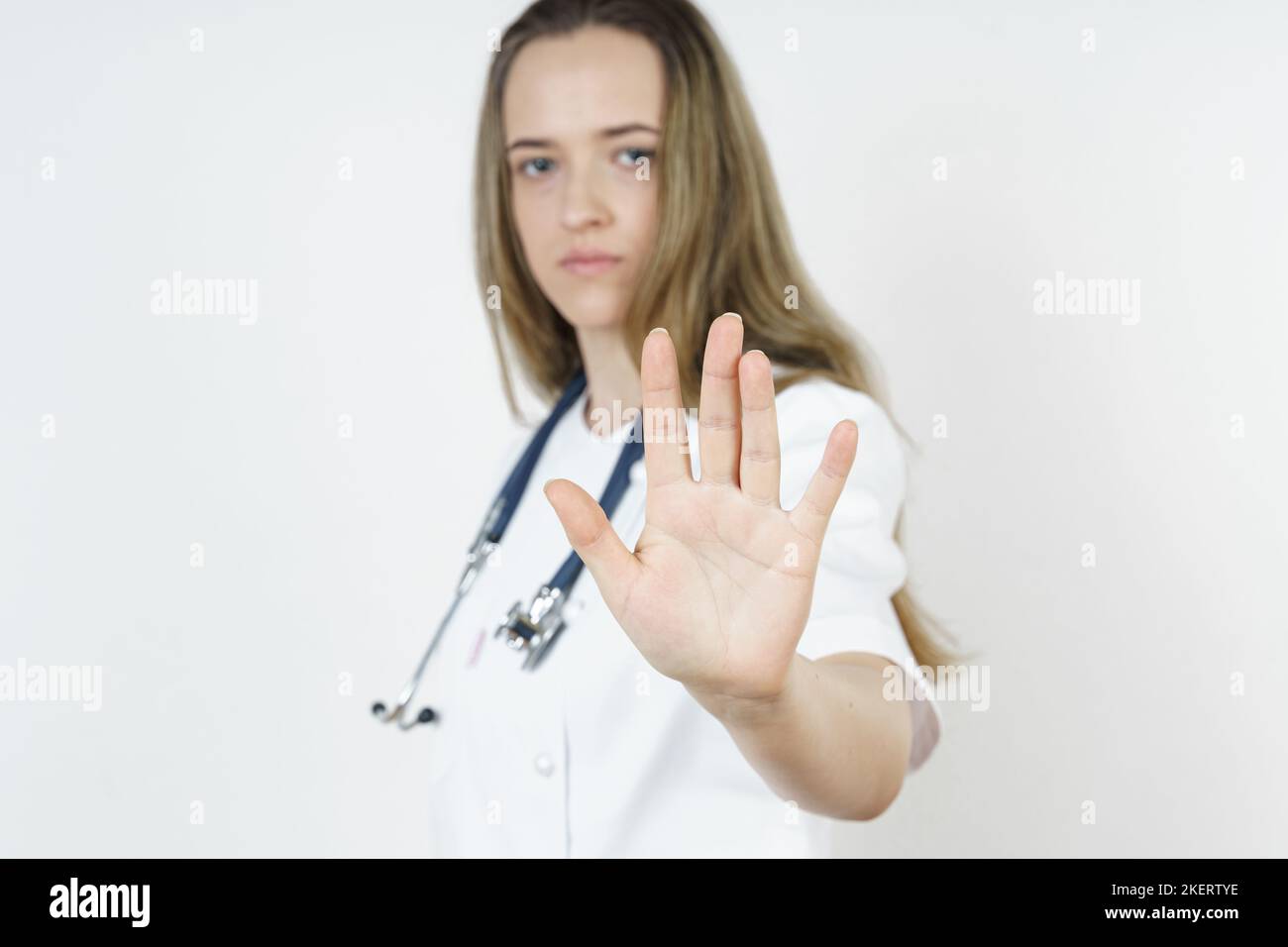 Medicine and health concept. The doctor makes a hand gesture - stop ...