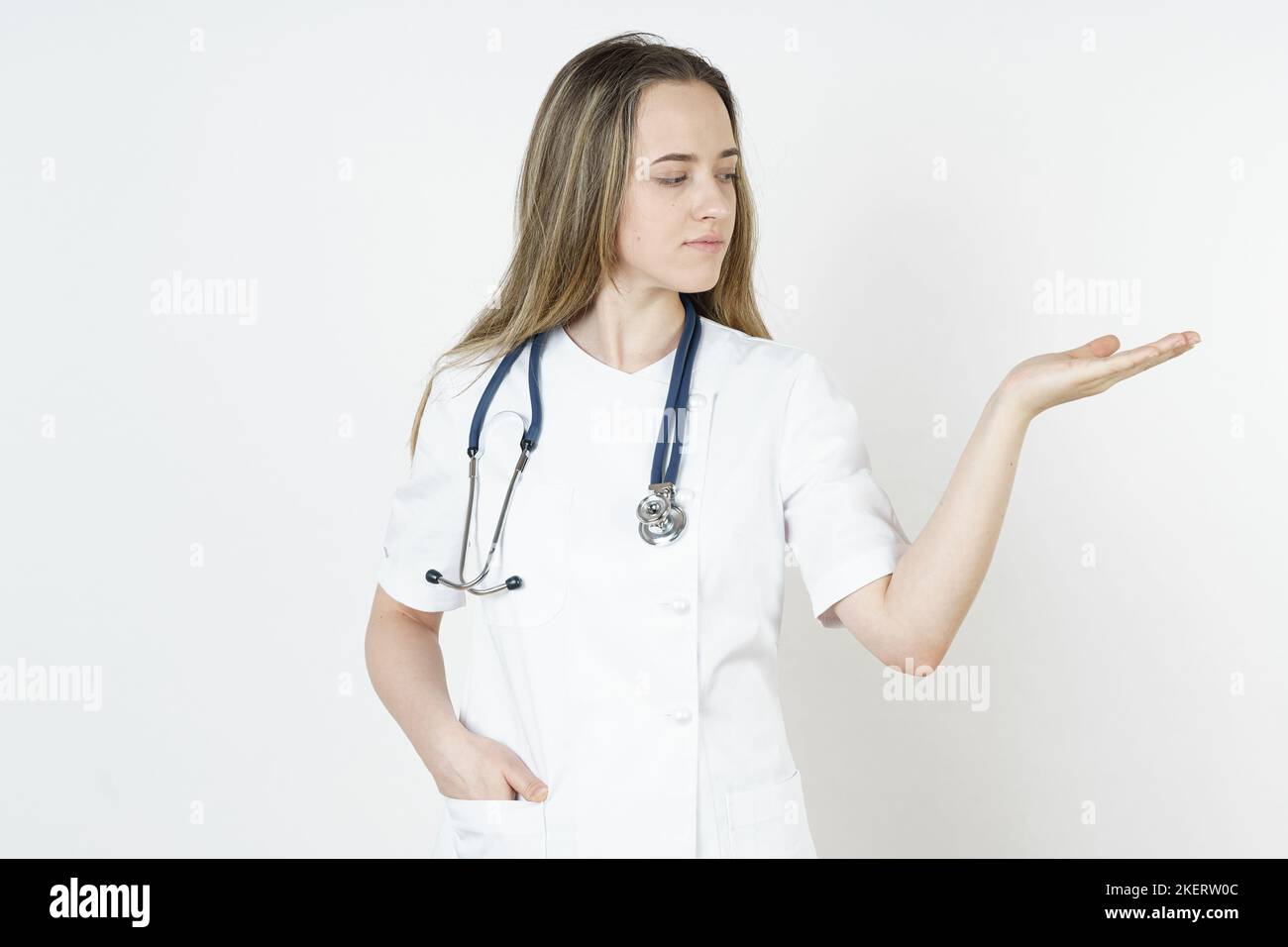 Medicine and health concept. Doctor pointing with his hands, raising ...