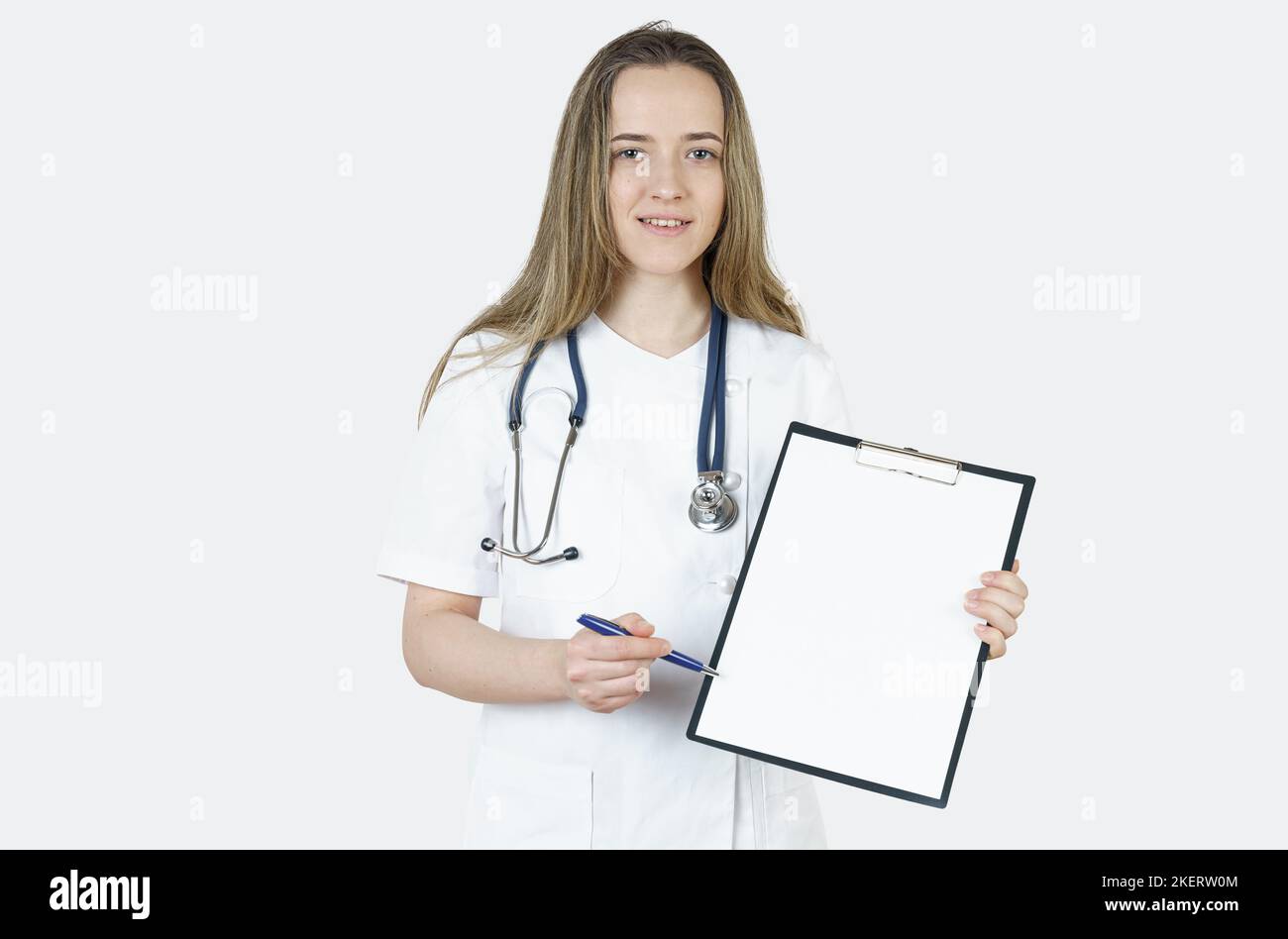 Medicine and health concept. Doctor pointing with a pen to a tablet ...
