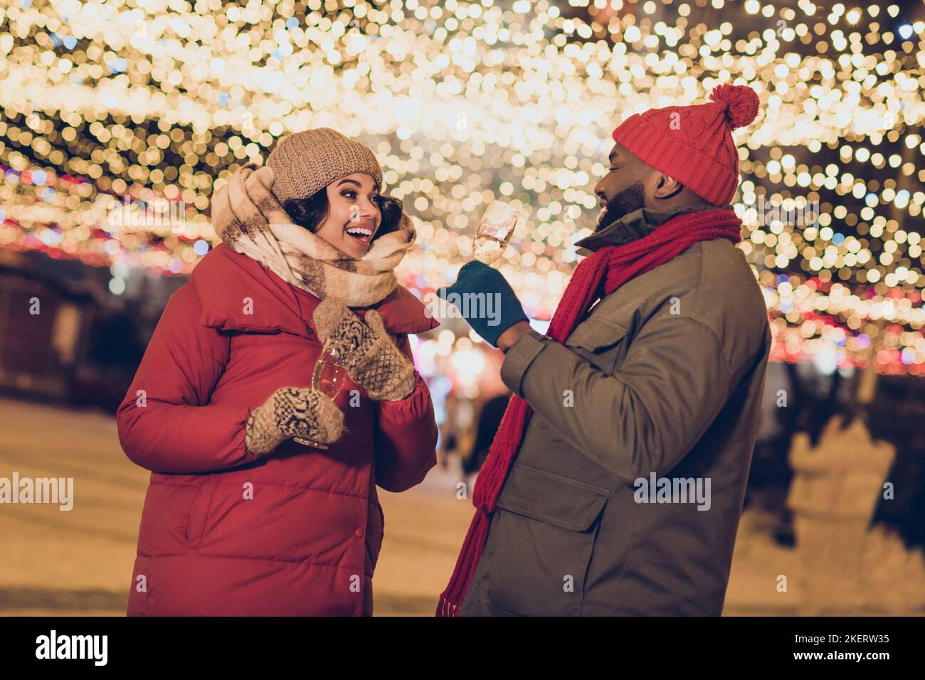 Portrait of two affectionate cheerful people having fun wish dream ...