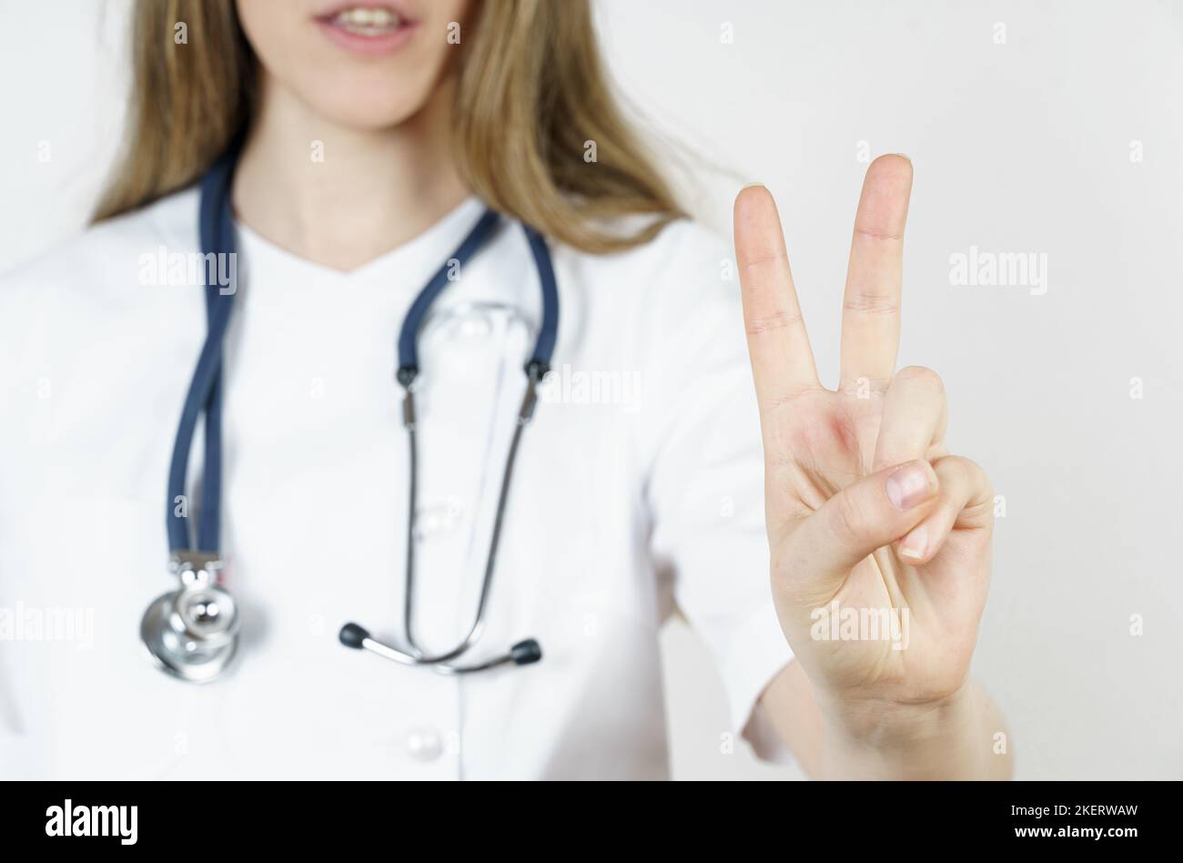 Medicine and health concept. The doctor makes a countdown with his ...