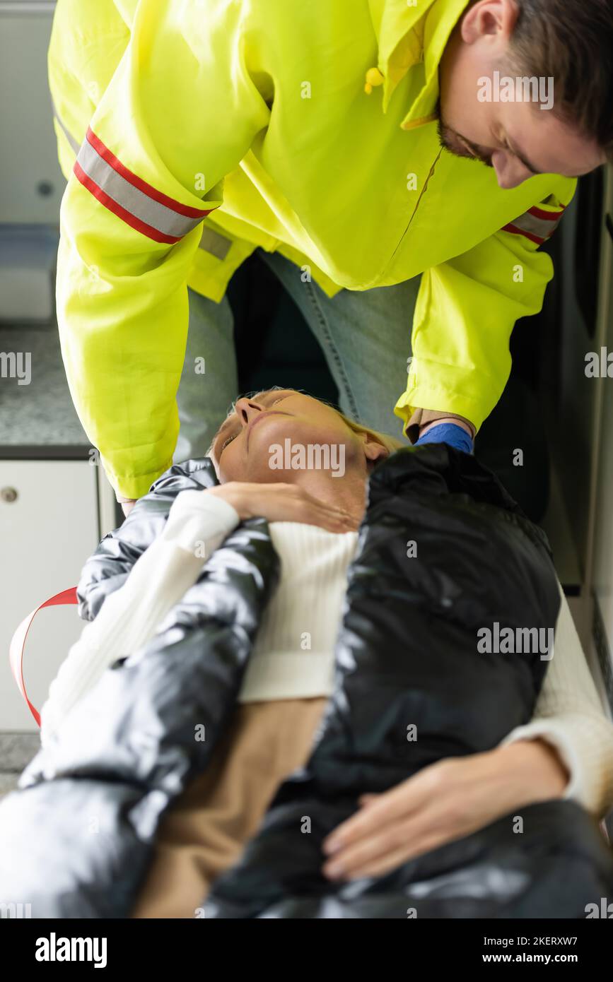 Giving first aid hi-res stock photography and images - Alamy
