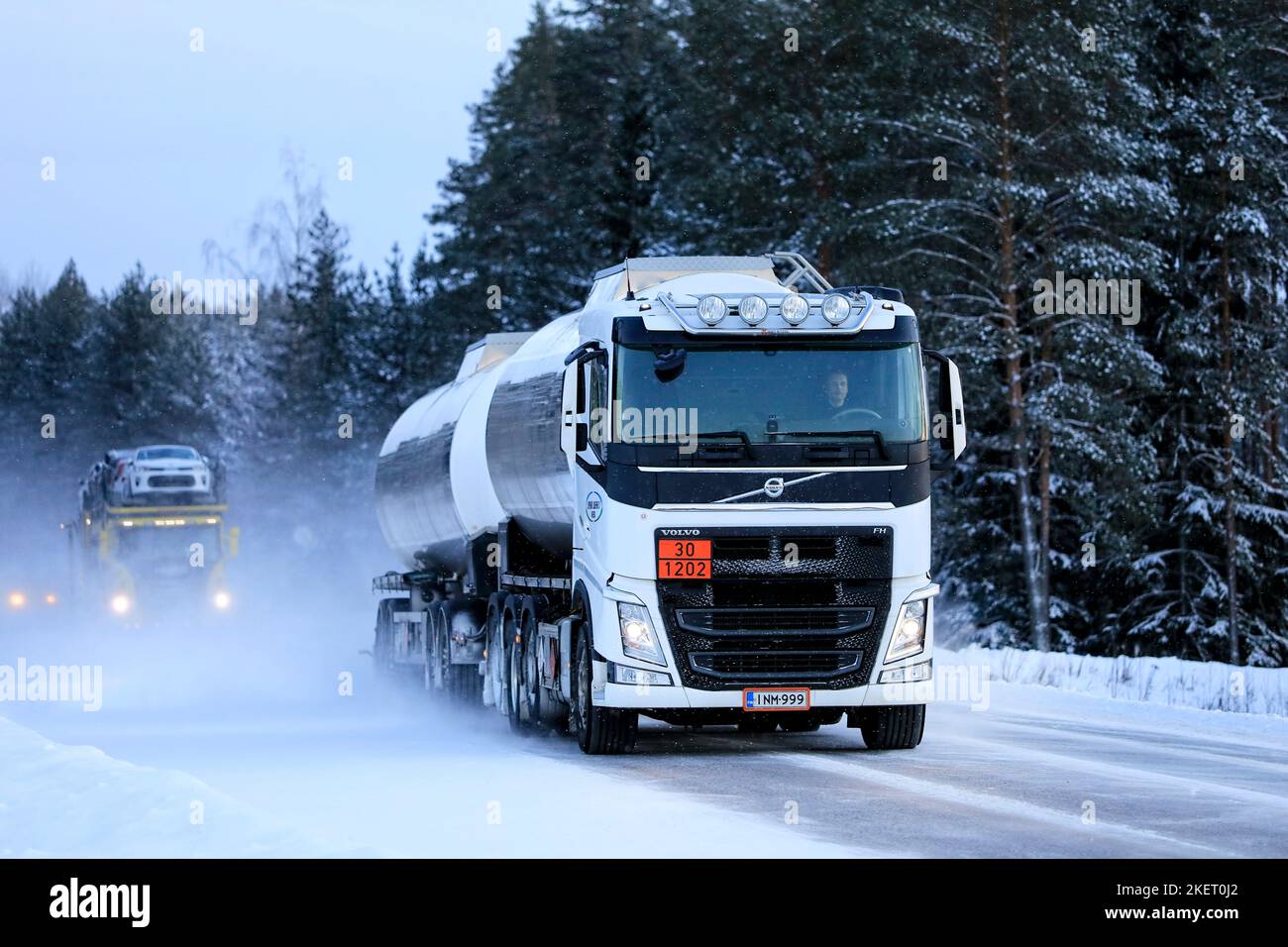 Volvo FH tanker truck transports diesel oil, ADR 30-1202, on snowy ...