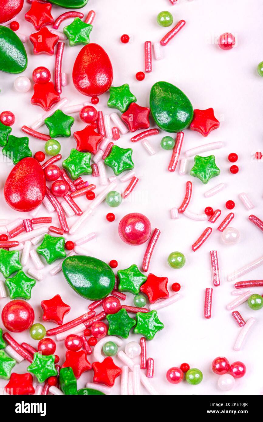 Christmas background of colorful candies. Red and green candies of ...