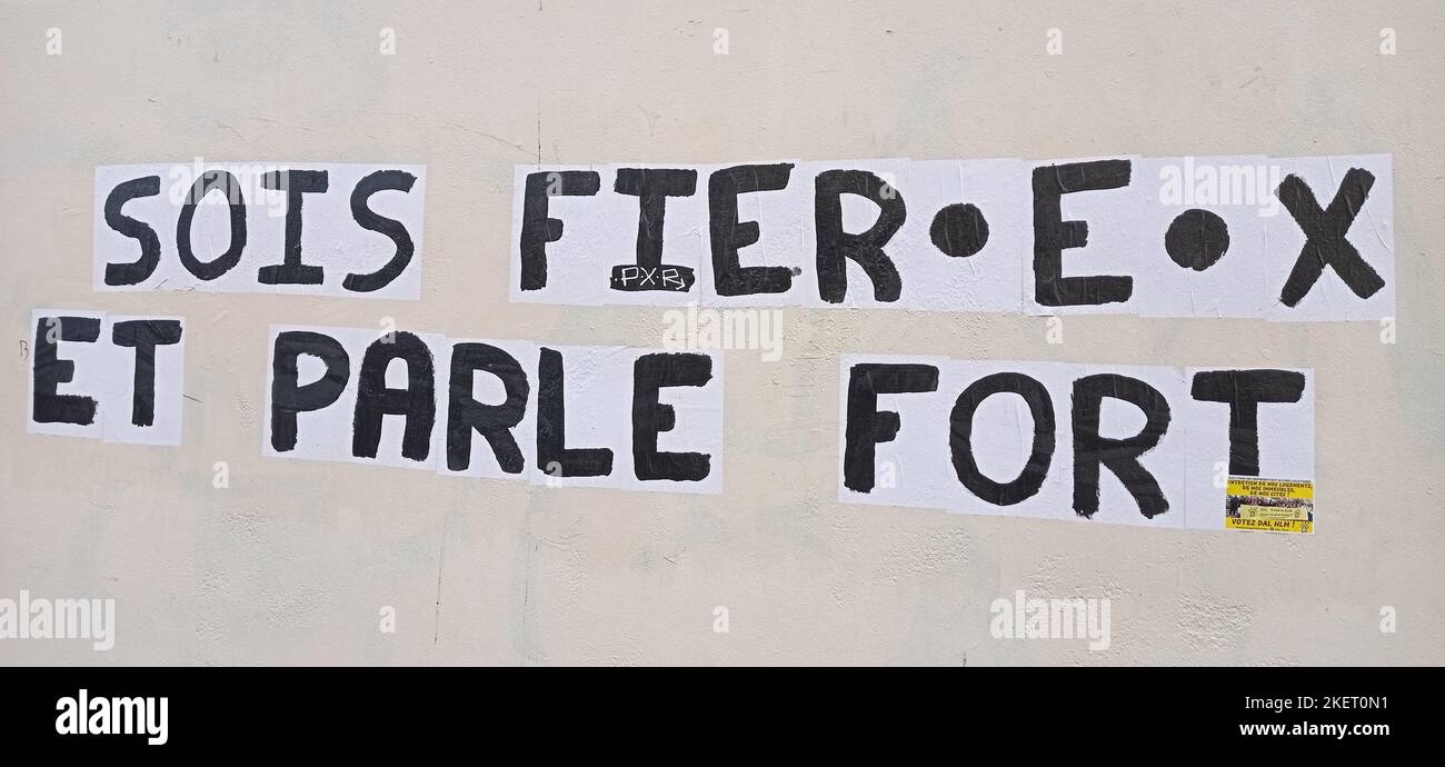 Une affiche sur un mur parisien SOIT FIER E X ET PARLE FORT , France ...