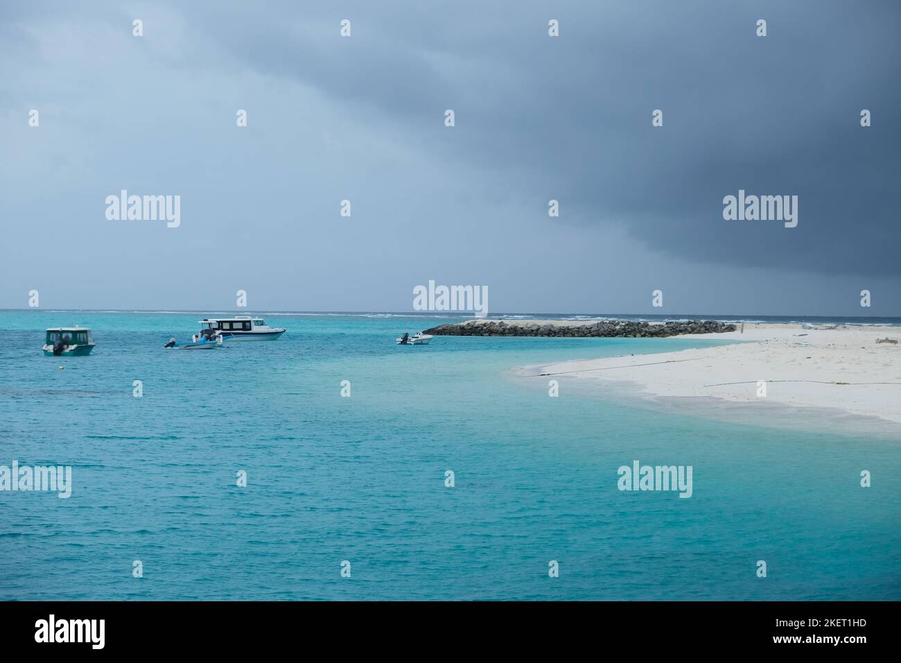 Beautiful beach of Fulidhoo, Maldives during raining season, with ...
