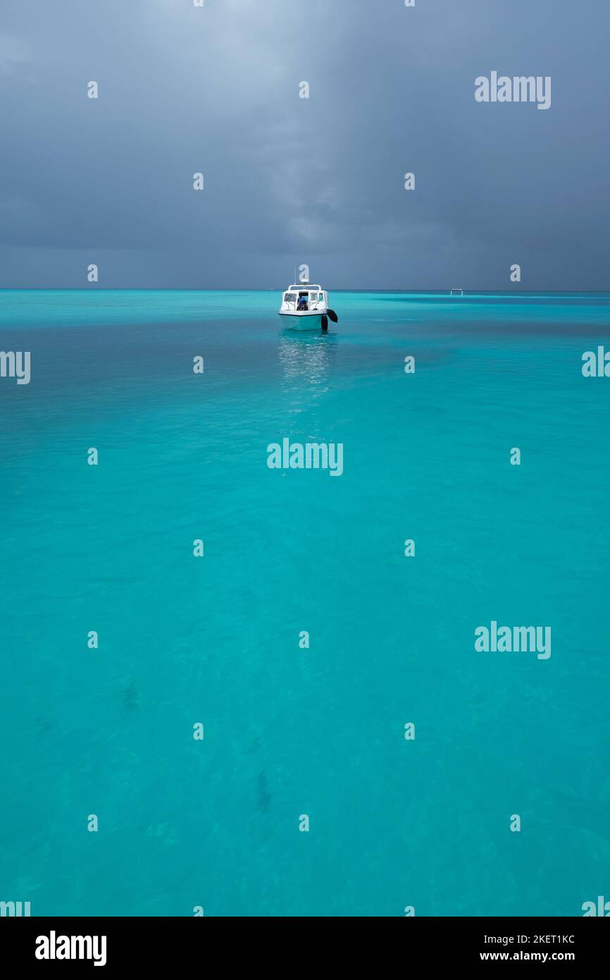 Beautiful beach of Fulidhoo, Maldives during raining season, with ...