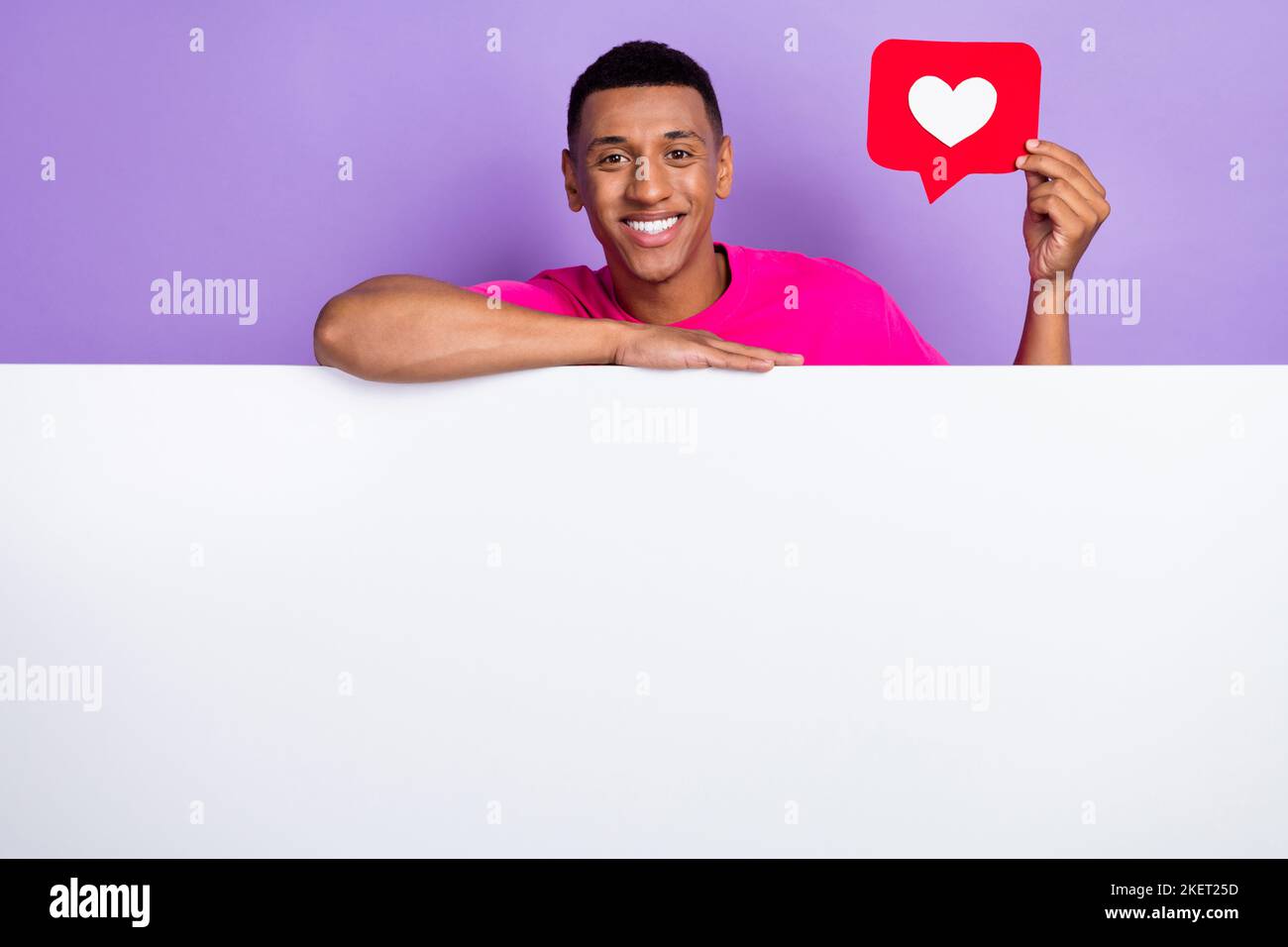 Photo of attractive guy wear trendy pink outfit stand behind empty ...