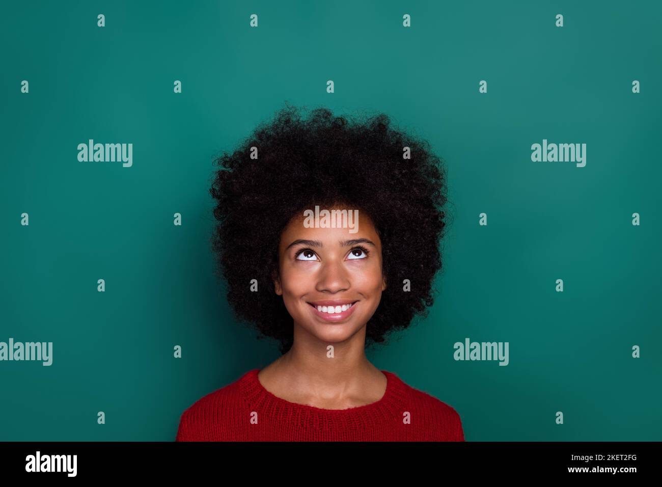 Photo portrait of cute small girl look up empty space new year card ...