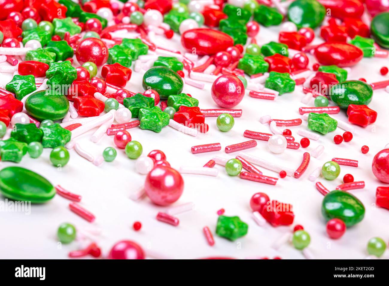 Christmas background of colorful candies. Red and green candies of ...