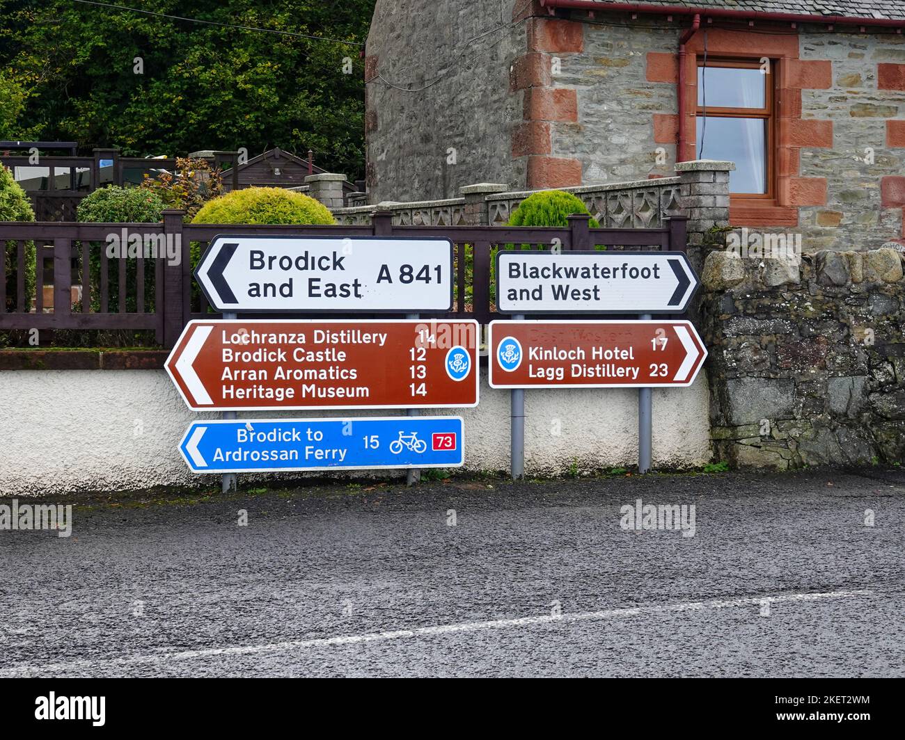 Directional signs leading from the village of Lochranza to villages ...