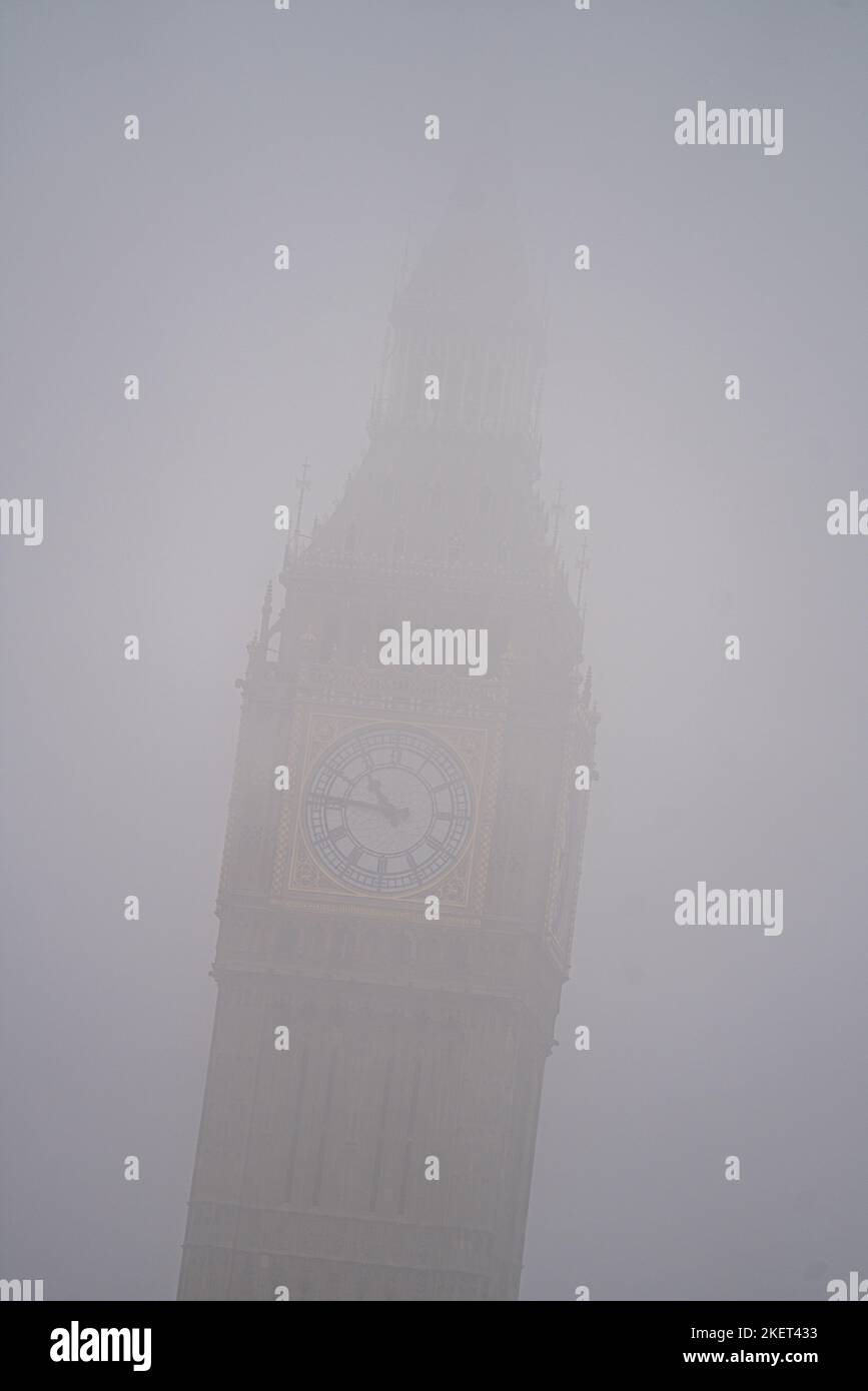 Big Ben clock tower shrouded in thick fog, London, England Stock Photo ...