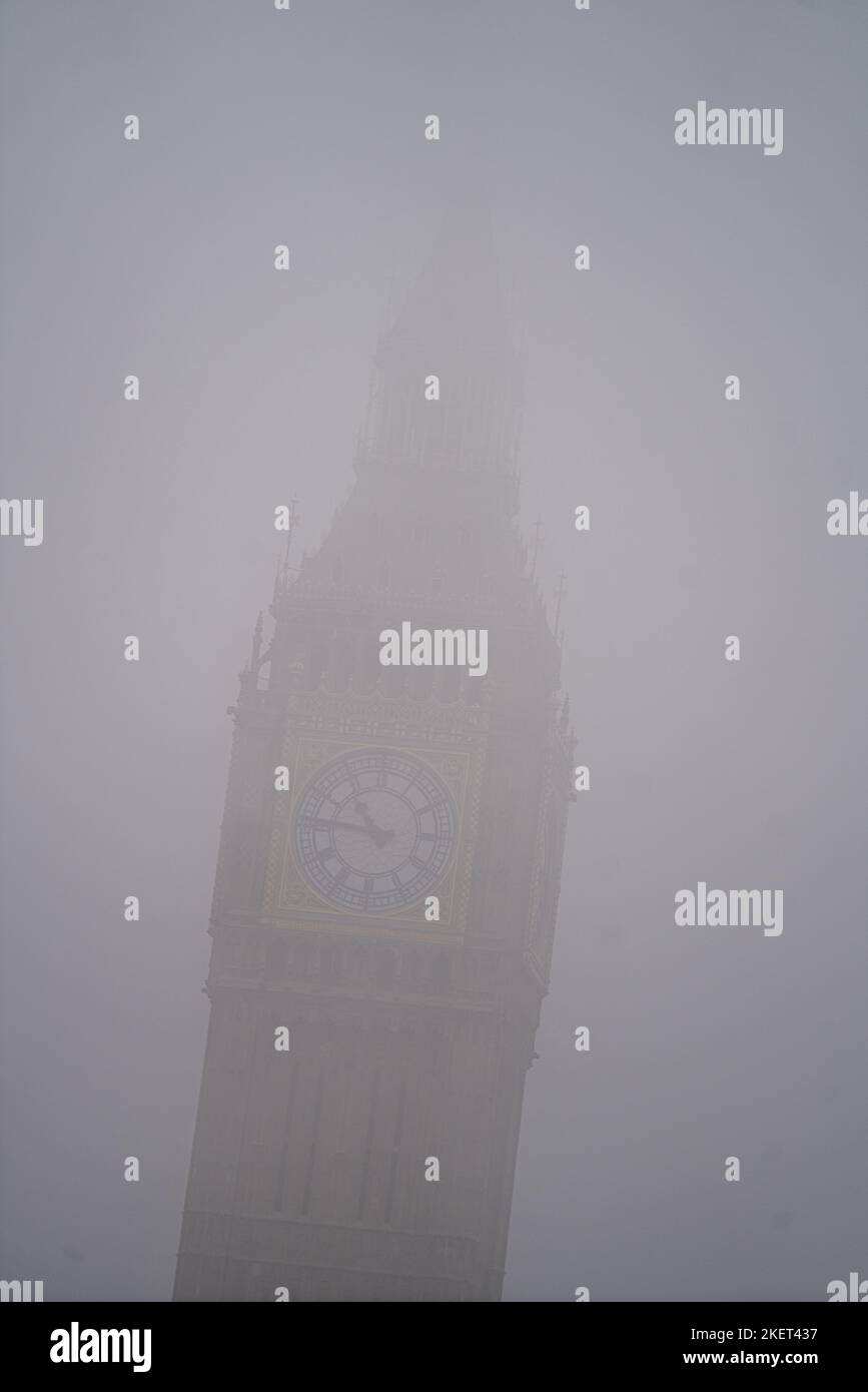 Big Ben clock tower shrouded in thick fog, London, England Stock Photo ...