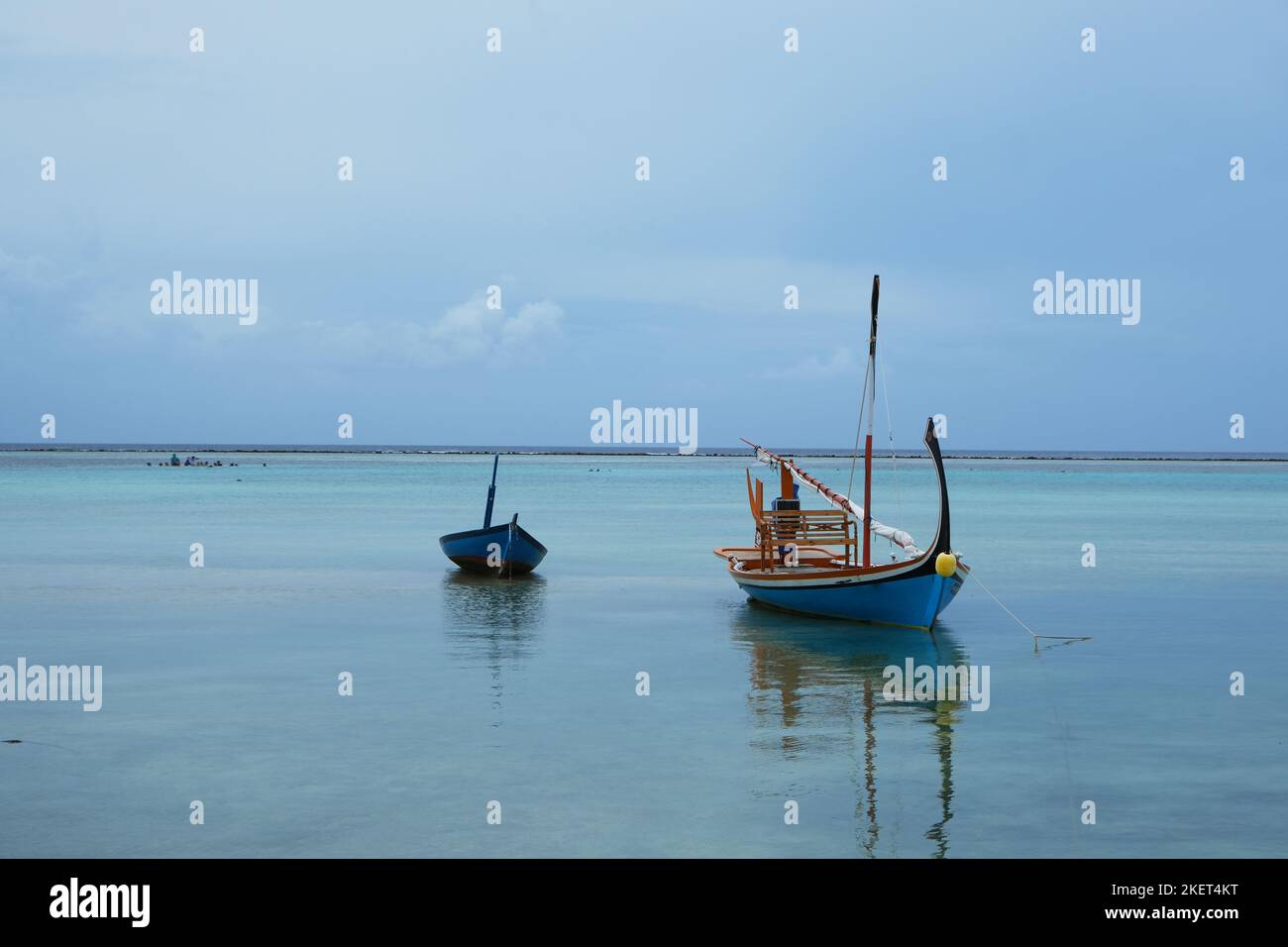 A Dhoni is a traditional multi-purpose sailvessel with a motor or ...