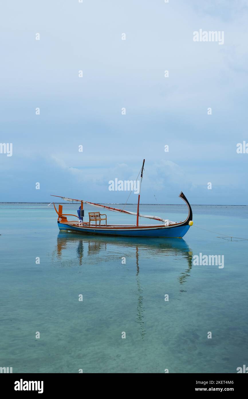 A Dhoni is a traditional multi-purpose sailvessel with a motor or ...