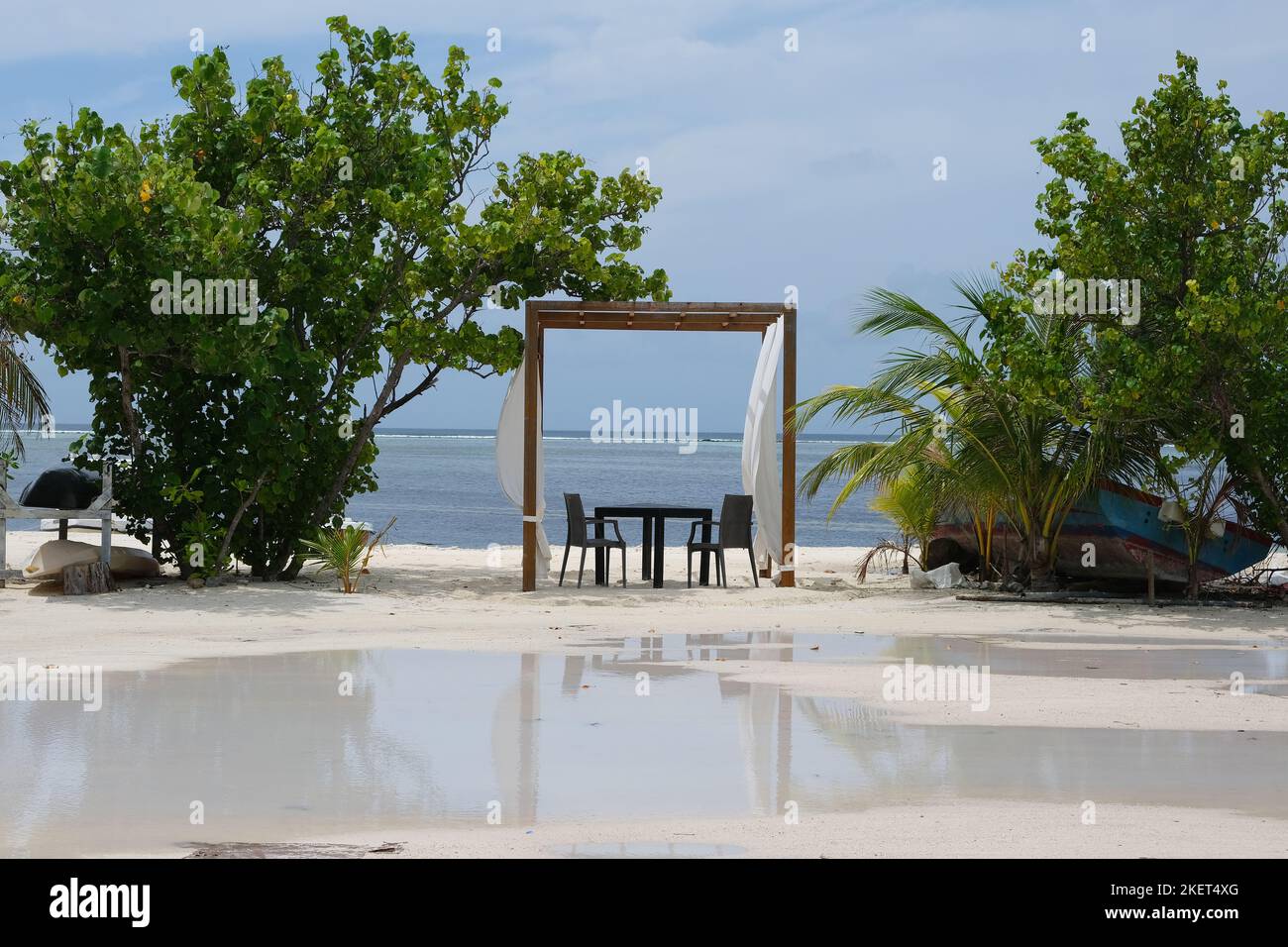Romantic outdoor dining booth at Maafushi Island, facing the indian ...