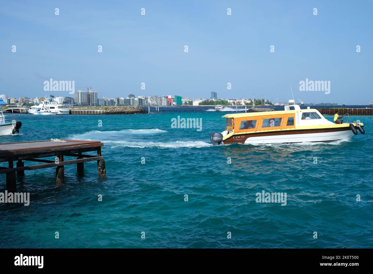 The harbour at Male International Airport Maldives with ferry crossing ...