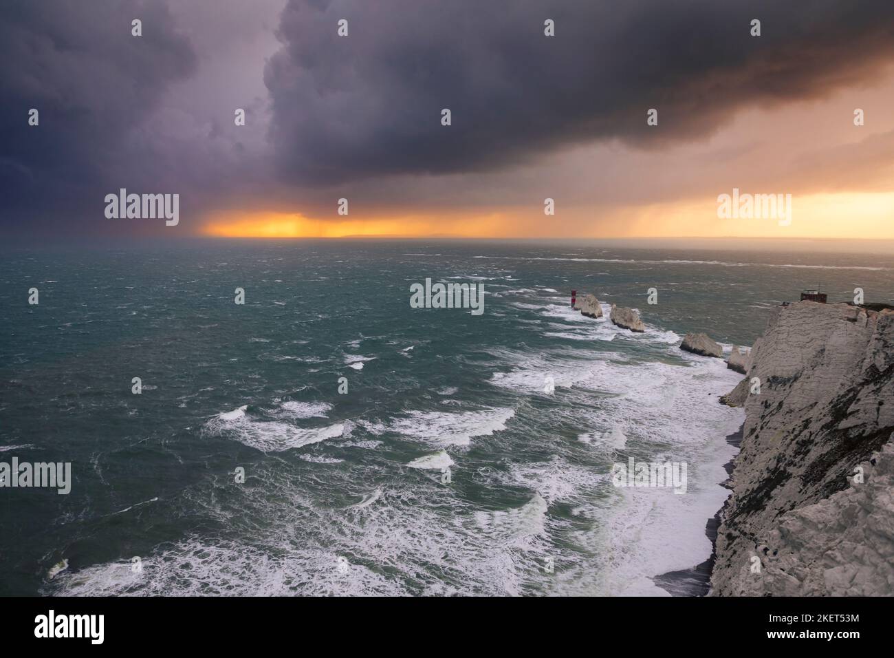 Stormy sunset at The Needles viewpoint Isle of Wight south east England ...