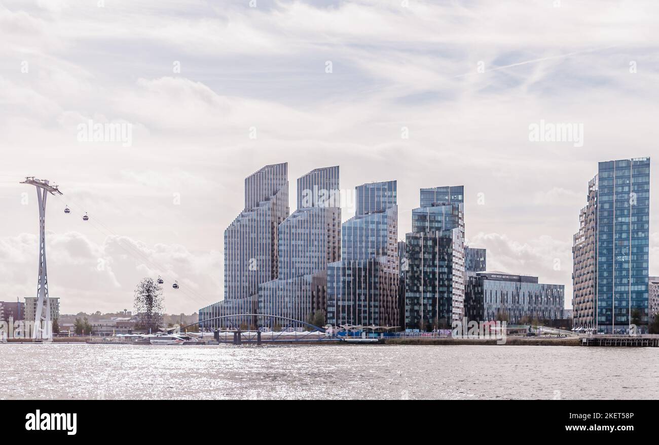 upper riverside modern apartment building complex with balconies and ...