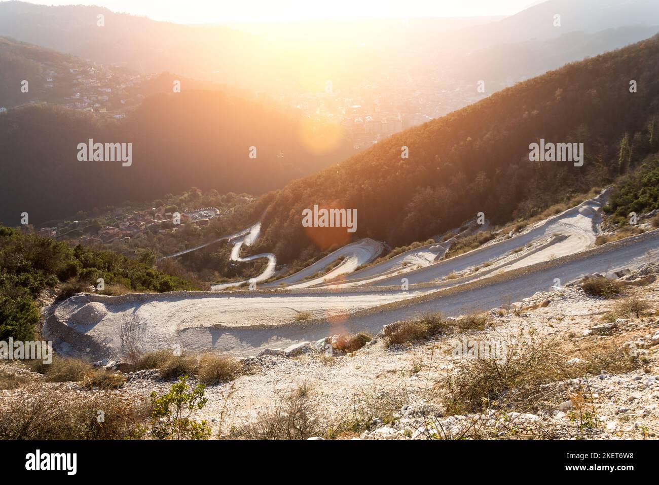 Wide angle view of winding road, laid to the top of the mountain ...