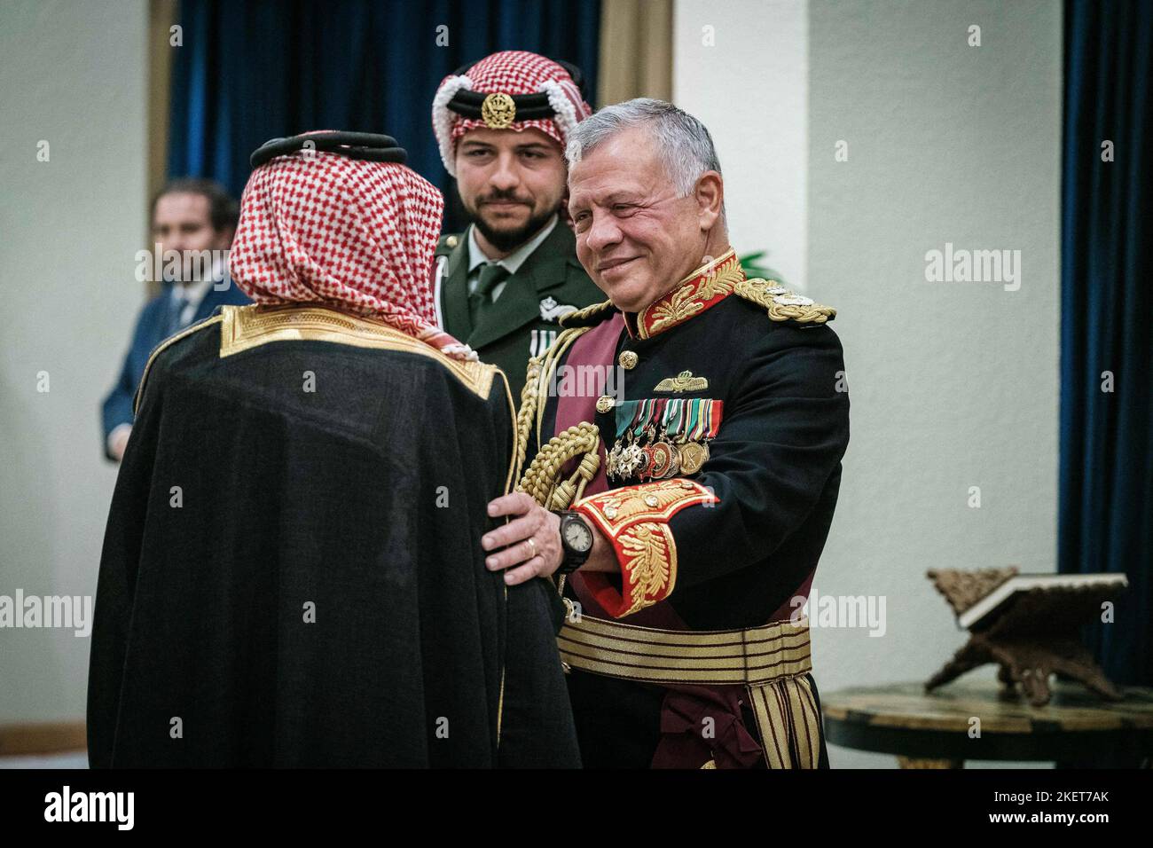 King Abdullah II of Jordan, with his son, Crown Prince Hussein (or Al Hussain), delivers a ...