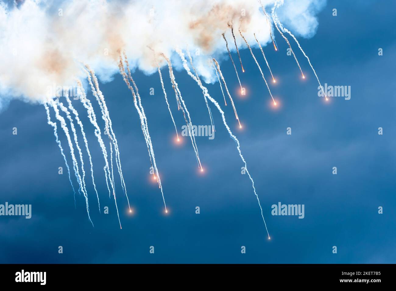 Outbreaks of warfare in the sky with explosives and smoke Stock Photo ...