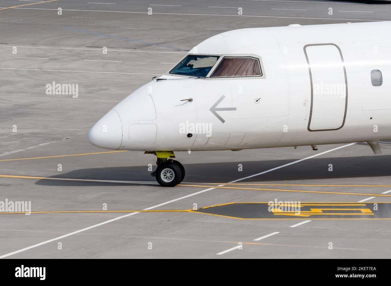 Nose and cockpit of the aircraft during taxiing on the runway Stock ...