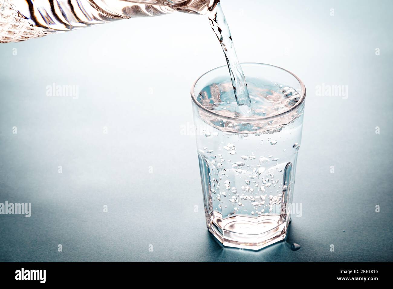 Pure water splashing from bottle hi-res stock photography and images ...