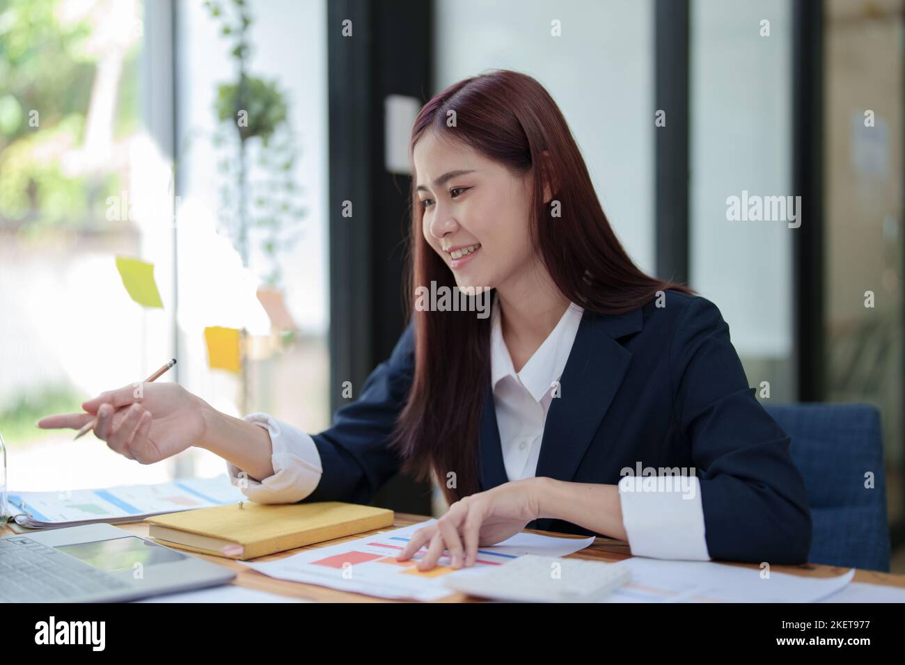 Business woman analyzing data using hi-res stock photography and images ...
