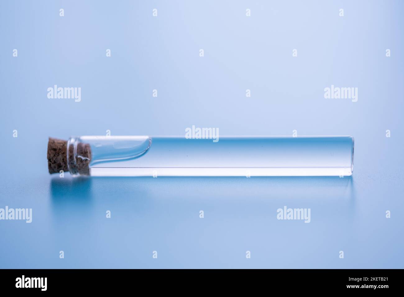 Small vial with a stopper of poison Stock Photo - Alamy