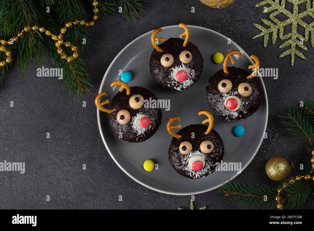 Homemade Christmas cupcakes Santa's reindeers on gray background ...