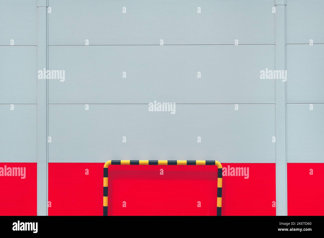 Impact protection guarding rail, yellow and black stripped bollard as ...