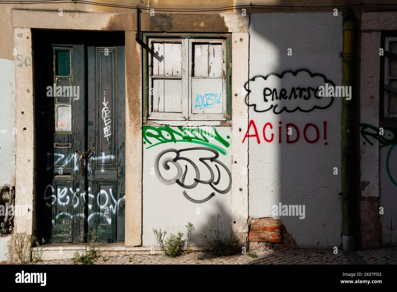 Condemned buildings are vandalised. The colourful streets of the ...