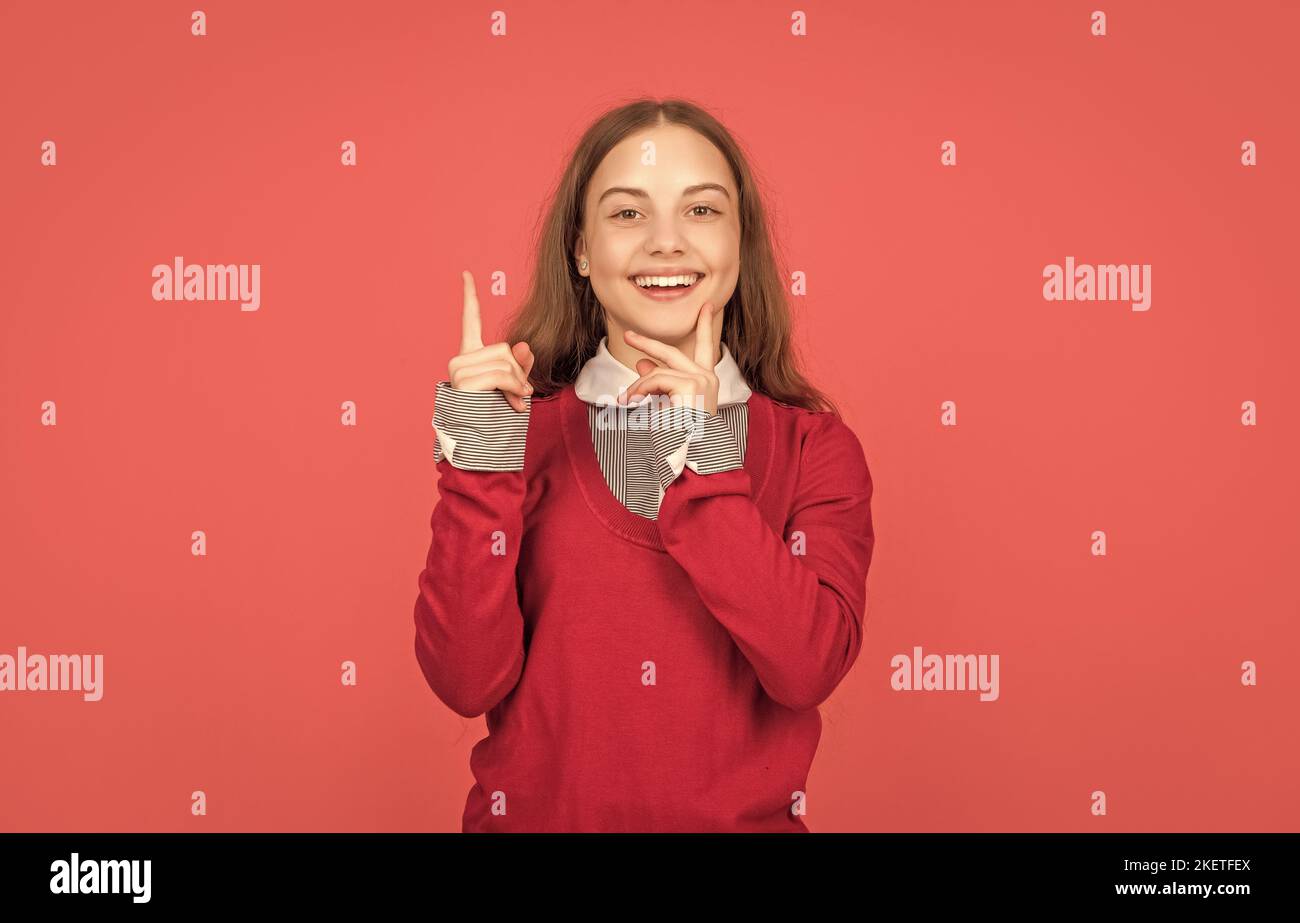 inspired with idea kid in school uniform on red background, childhood ...