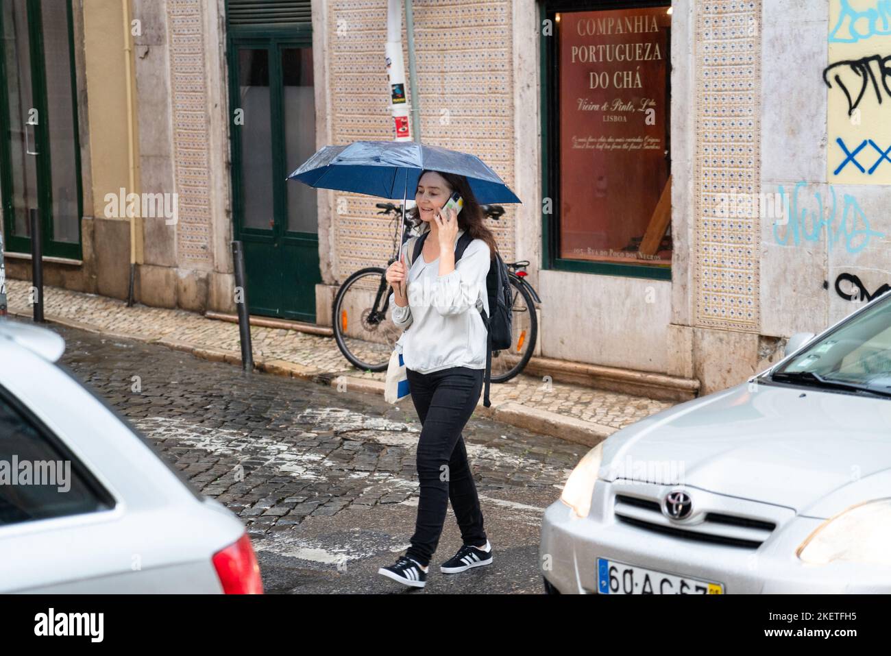 Woman umbrella rain storm hi-res stock photography and images - Alamy