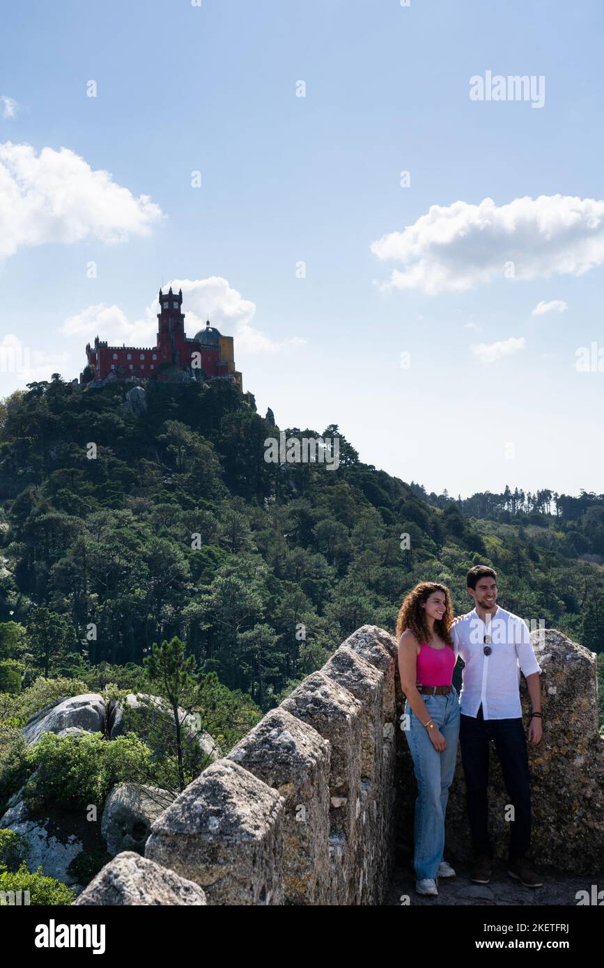 Tourists climb the fortified walls and turrets and take pictures at the ...