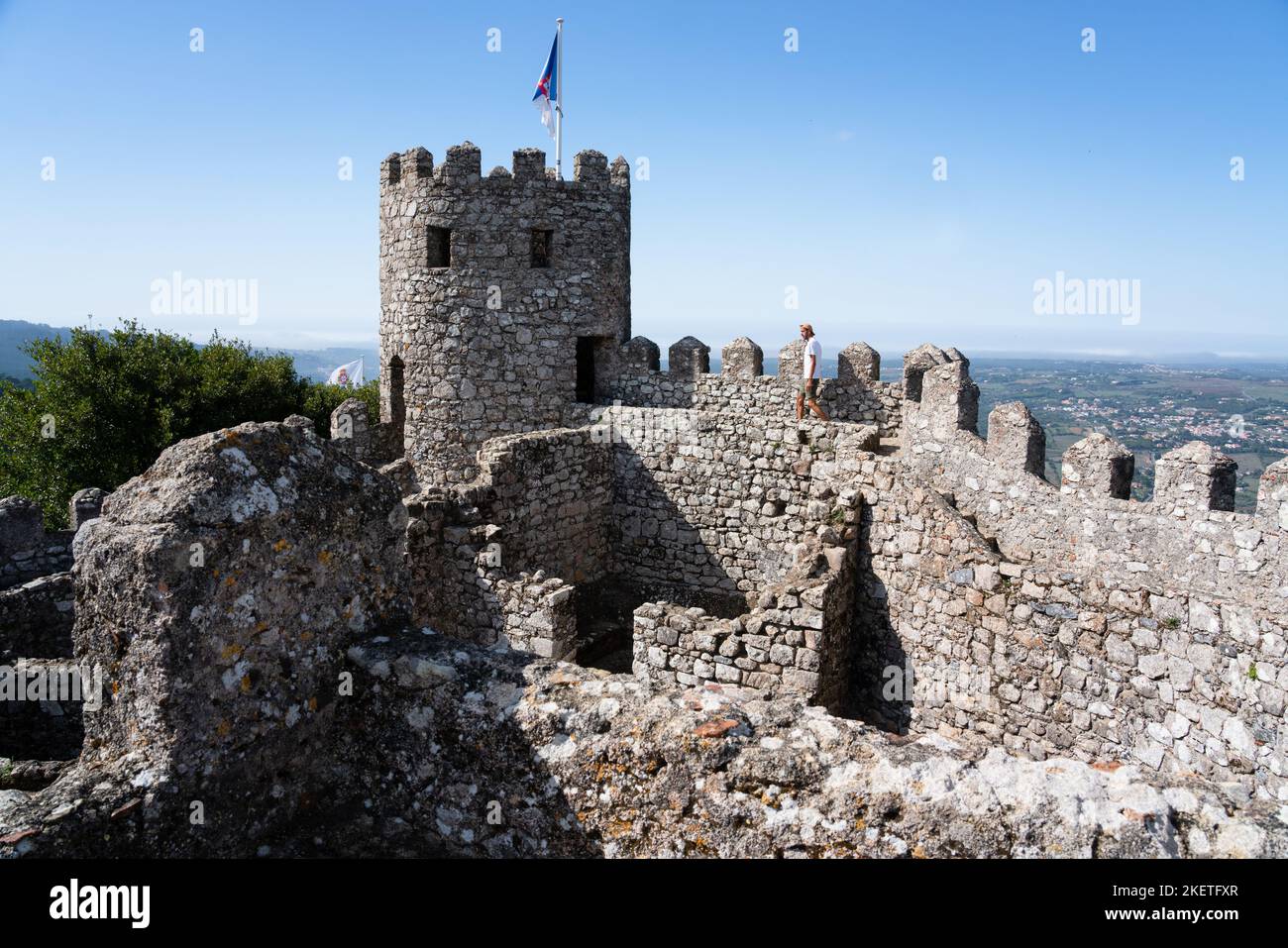 Tourists climb the fortified walls and turrets of the 10th century ...