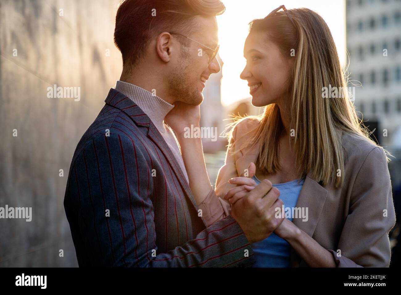 Happy successful business couple in love having fun together in urban ...